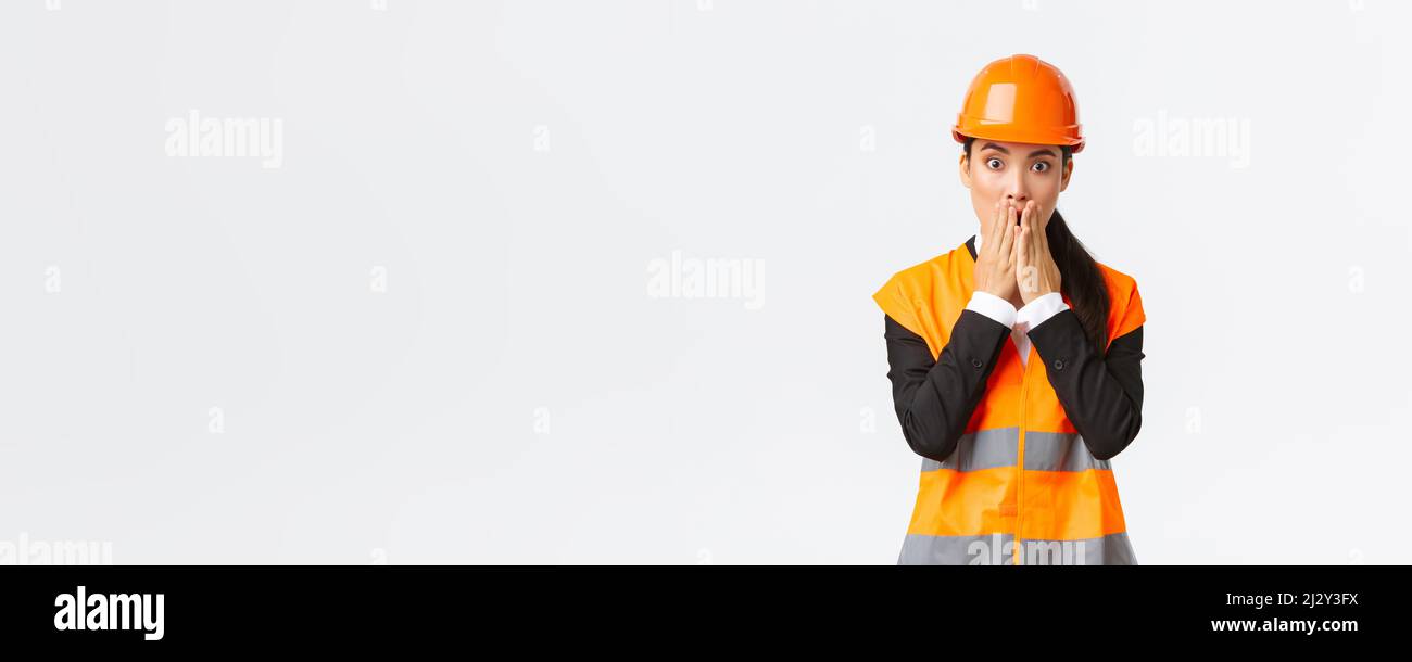 Concerned and worried asian female engineer having problem at ...