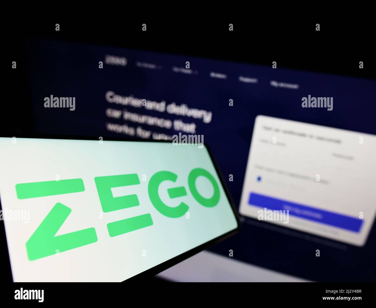 Mobile phone with logo of British insurance company Extracover Limited ...