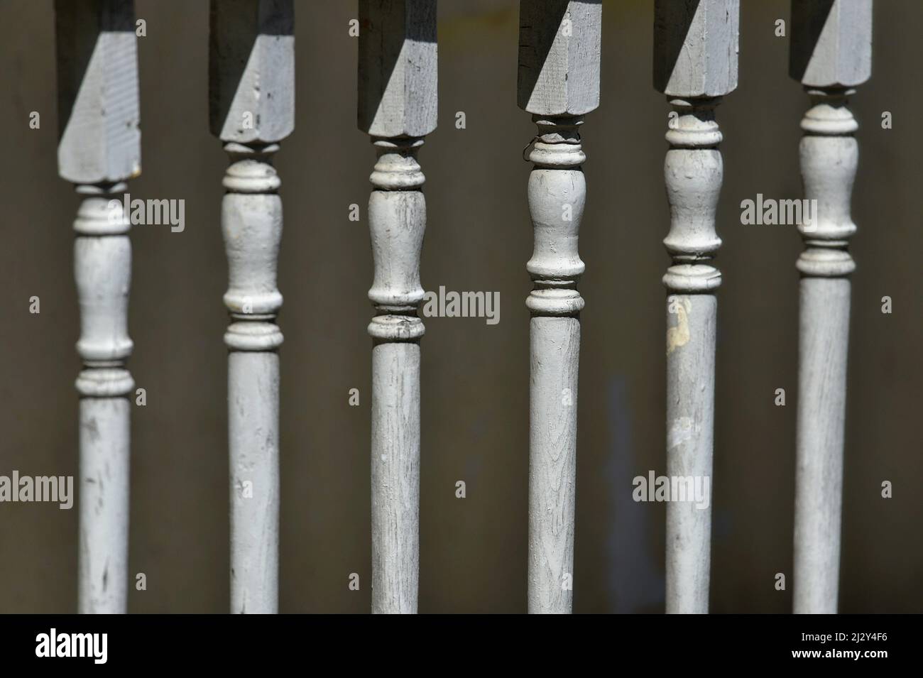 Traditional handcrafted wooden balustrade part of a rural house balcony ...