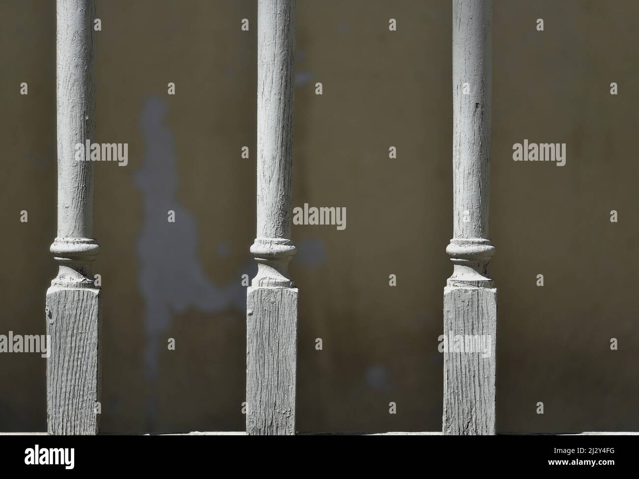 Traditional handcrafted wooden balustrade part of a rural house balcony ...