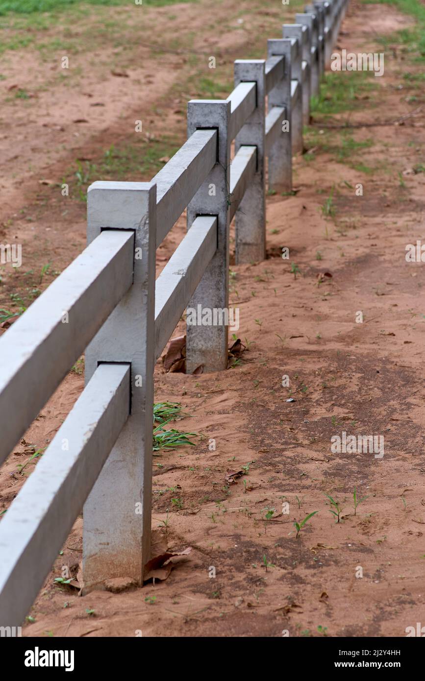 A closeup view of the cross on the concrete fence Stock Photo - Alamy