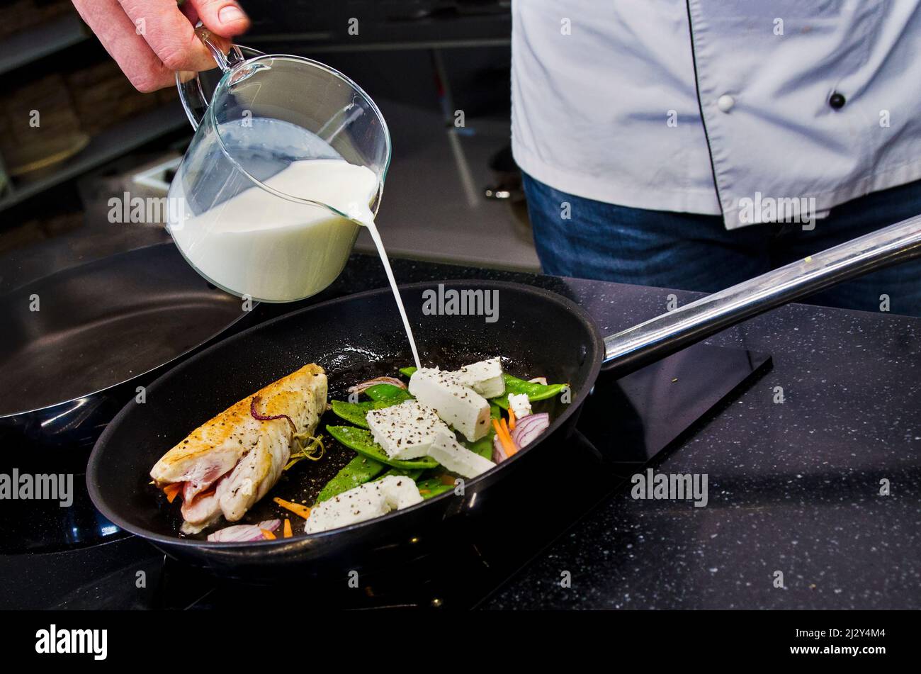 Chef dishes up meal hi-res stock photography and images - Alamy