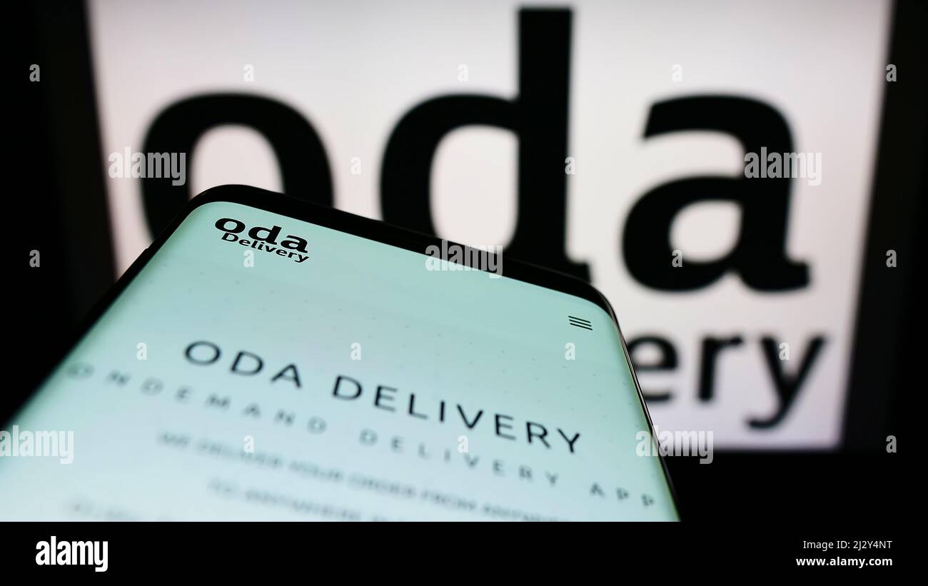 Smartphone with webpage of Saudi Arabian logistics company Oda Delivery ...