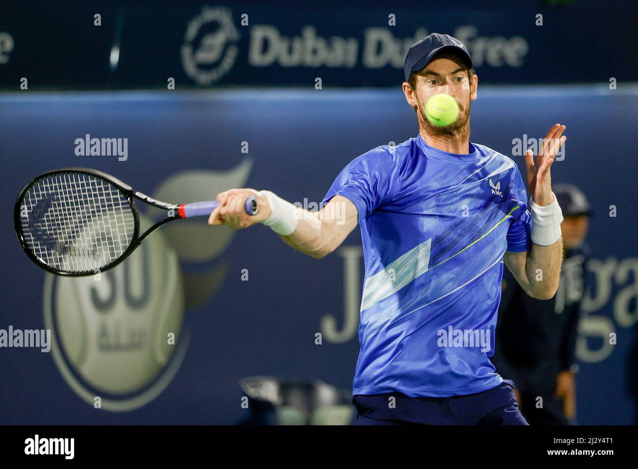 British tennis player Andy Murray playing a high forehand shot at the ...