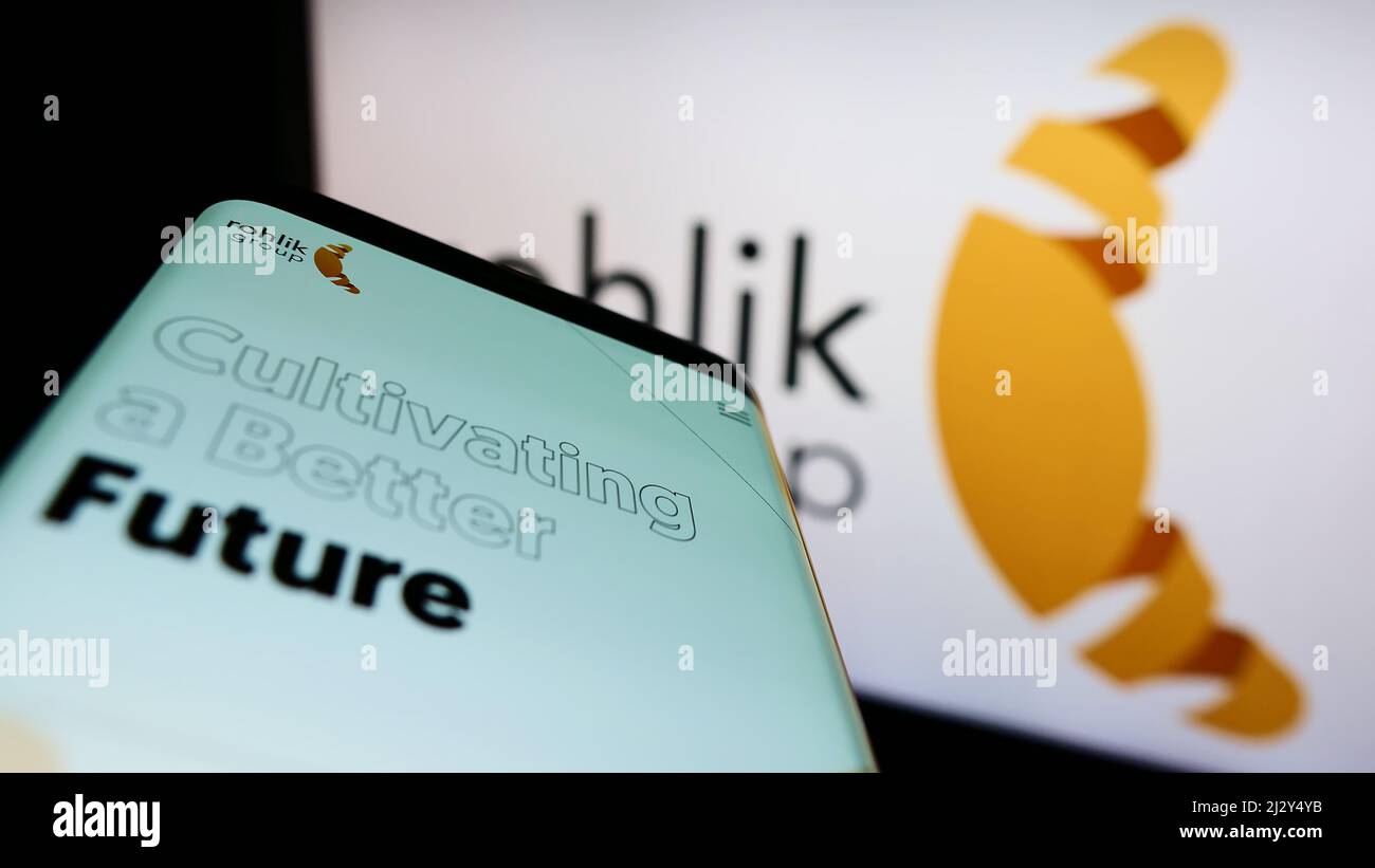 Mobile phone with webpage of Czech delivery company Rohlik Group a.s ...