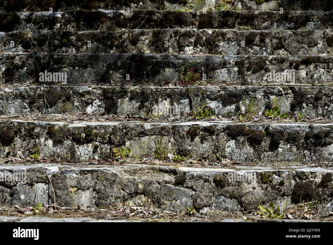 Old handcrafted stone steps in the rural town of Andritsaina in Ilia ...