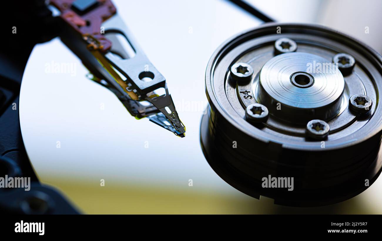 Macro Close up of inside of magnetic Hard Disc Drive with mirror ...