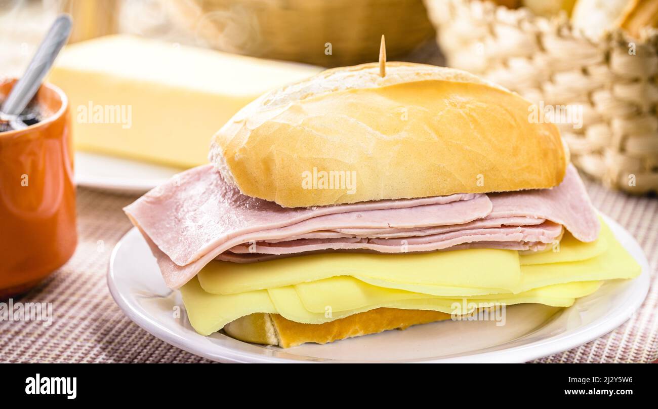 Brazilian breakfast, french salt bread with mozzarella cheese and ham ...