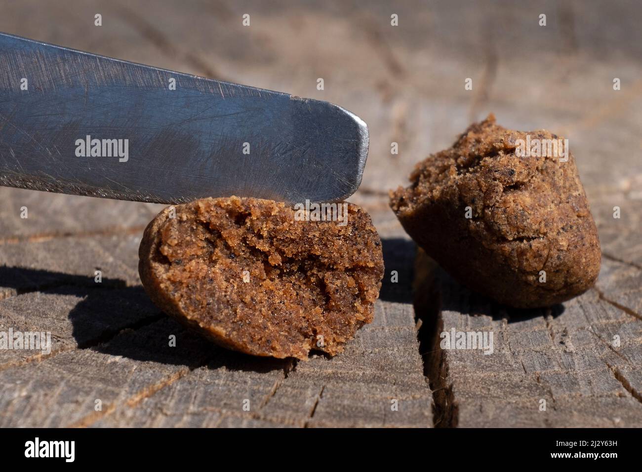 selling cannabis drugs, a piece of Moroccan hashish Stock Photo - Alamy