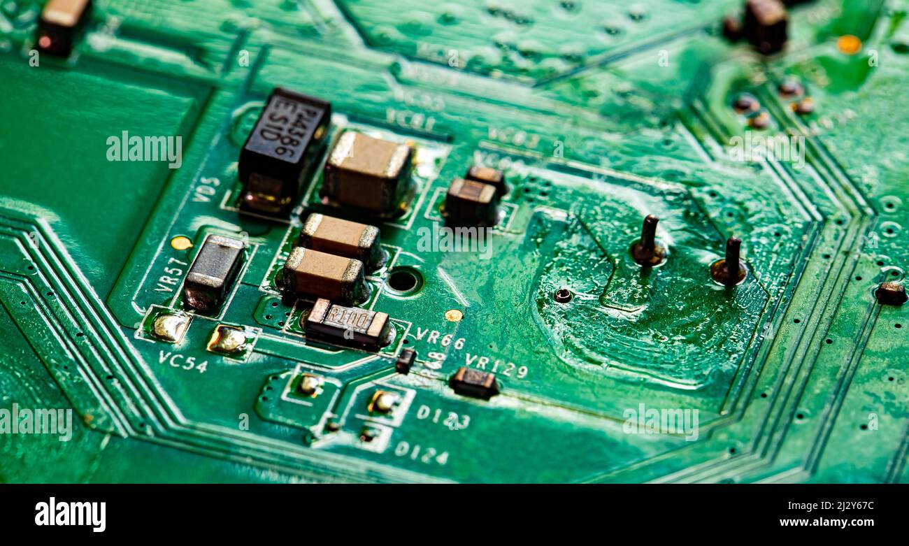 Macro Close up of printed wiring on PC circuit board of modem router ...
