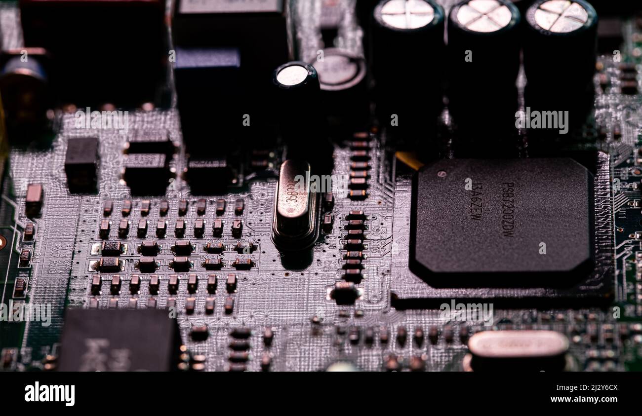 Macro Close up of components and microchips on PC circuit board of ...