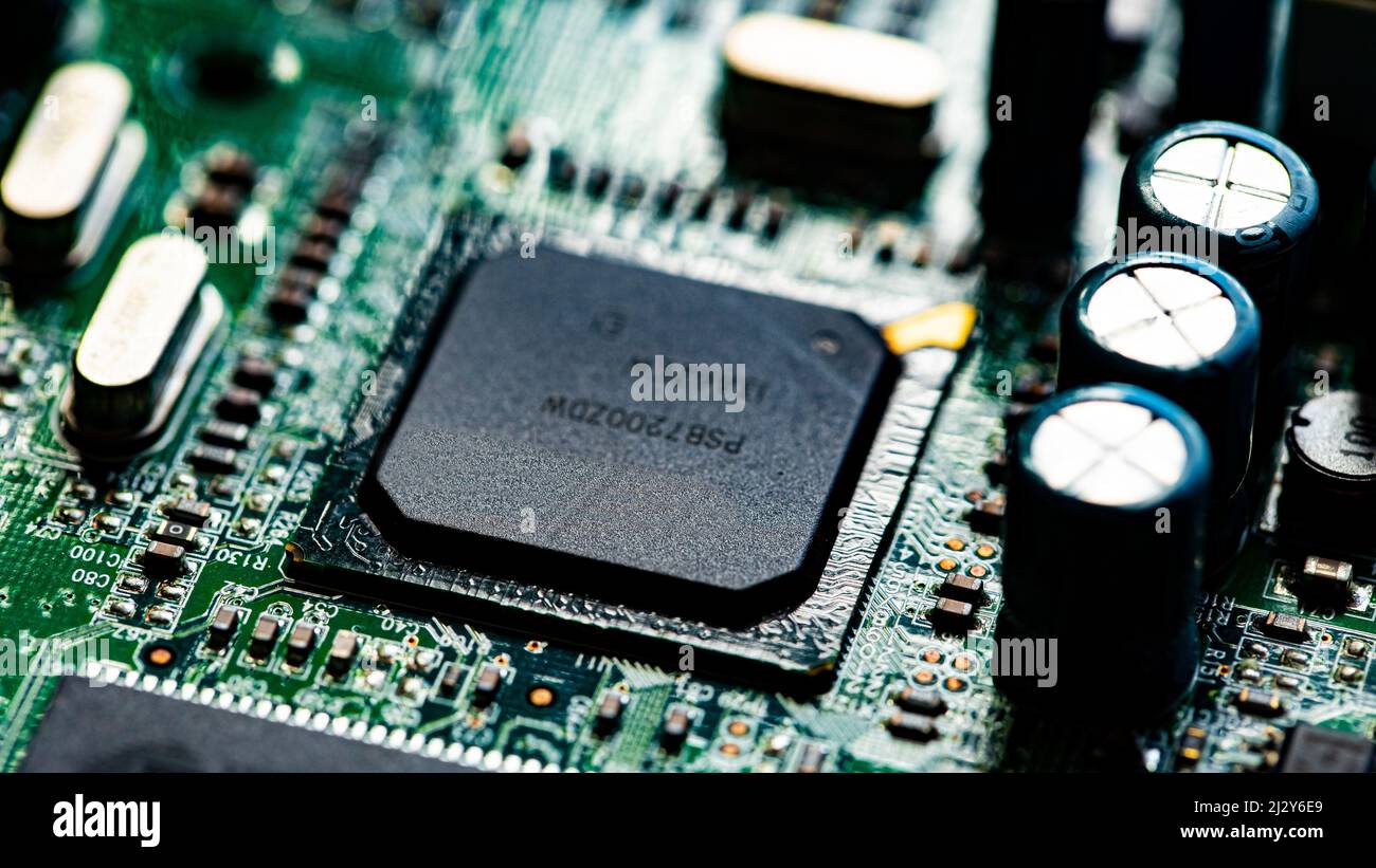 Macro Close up of components and microchips on PC circuit board of ...