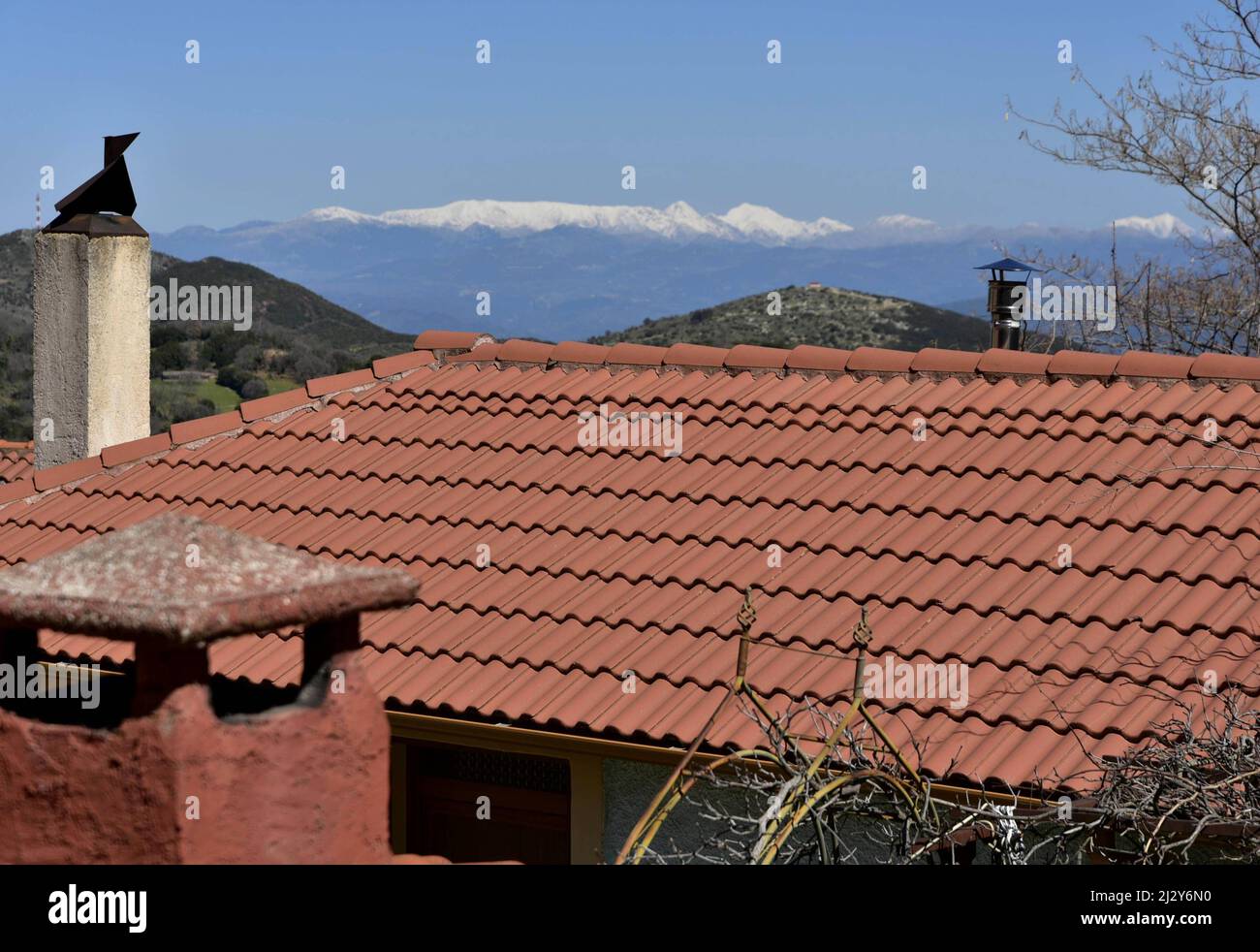 Landscape with scenic view of a traditional red clay tile rooftop with ...
