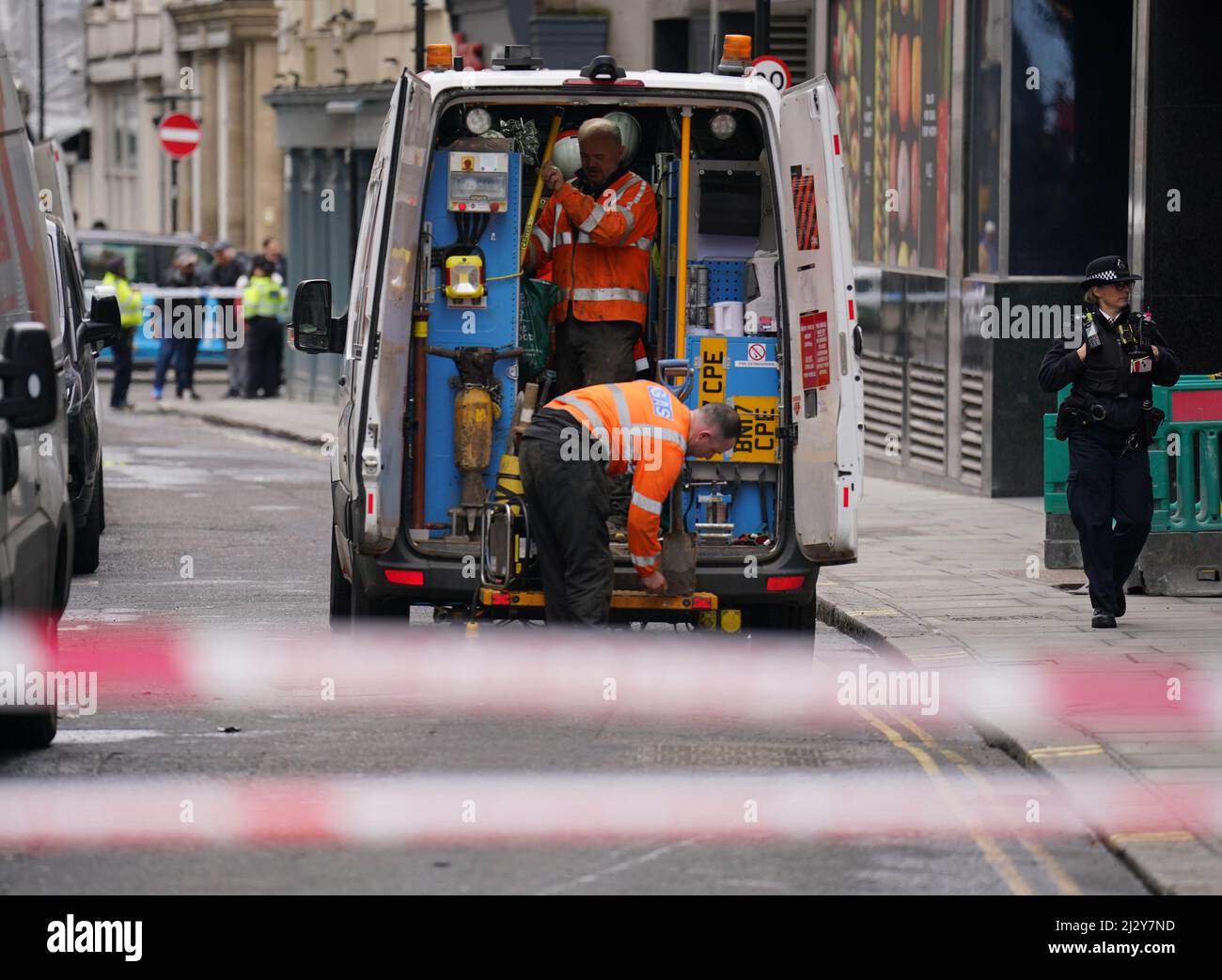 Police erect a cordon on junction of Oxford Street and Poland Street ...