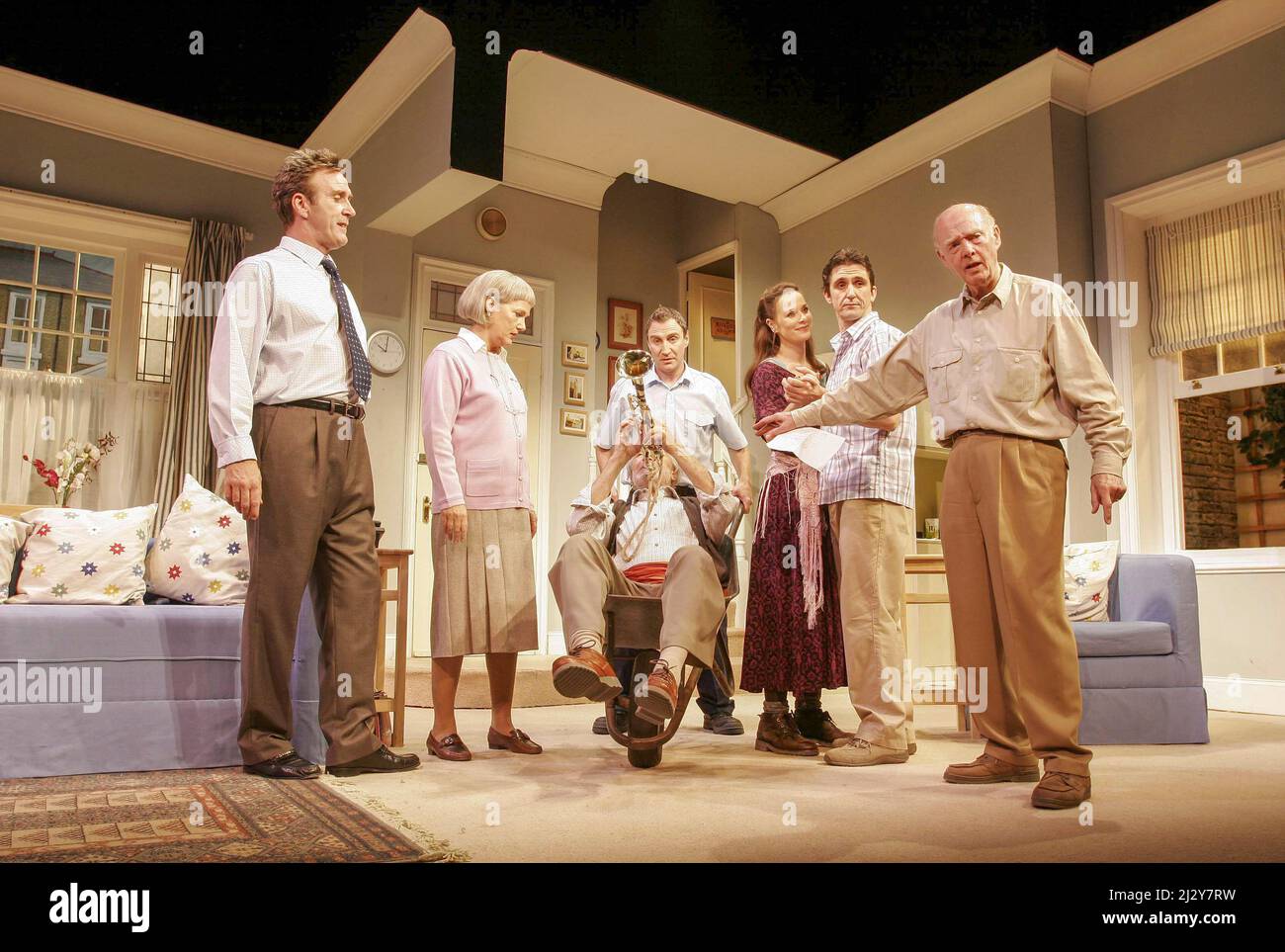 right: Ray Cooney - author & director, on stage with the cast of TOM ...