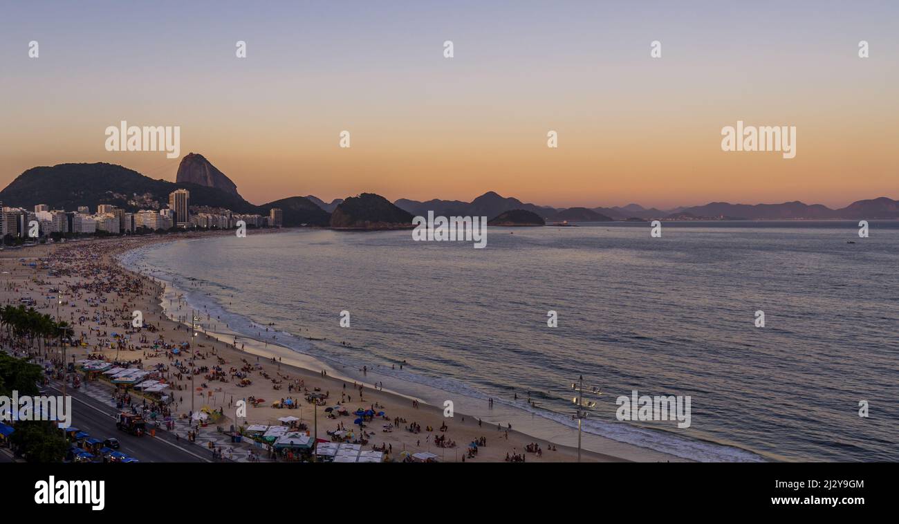 An aerial view of a sunset over the Copacabana beach in Rio de Janeiro ...