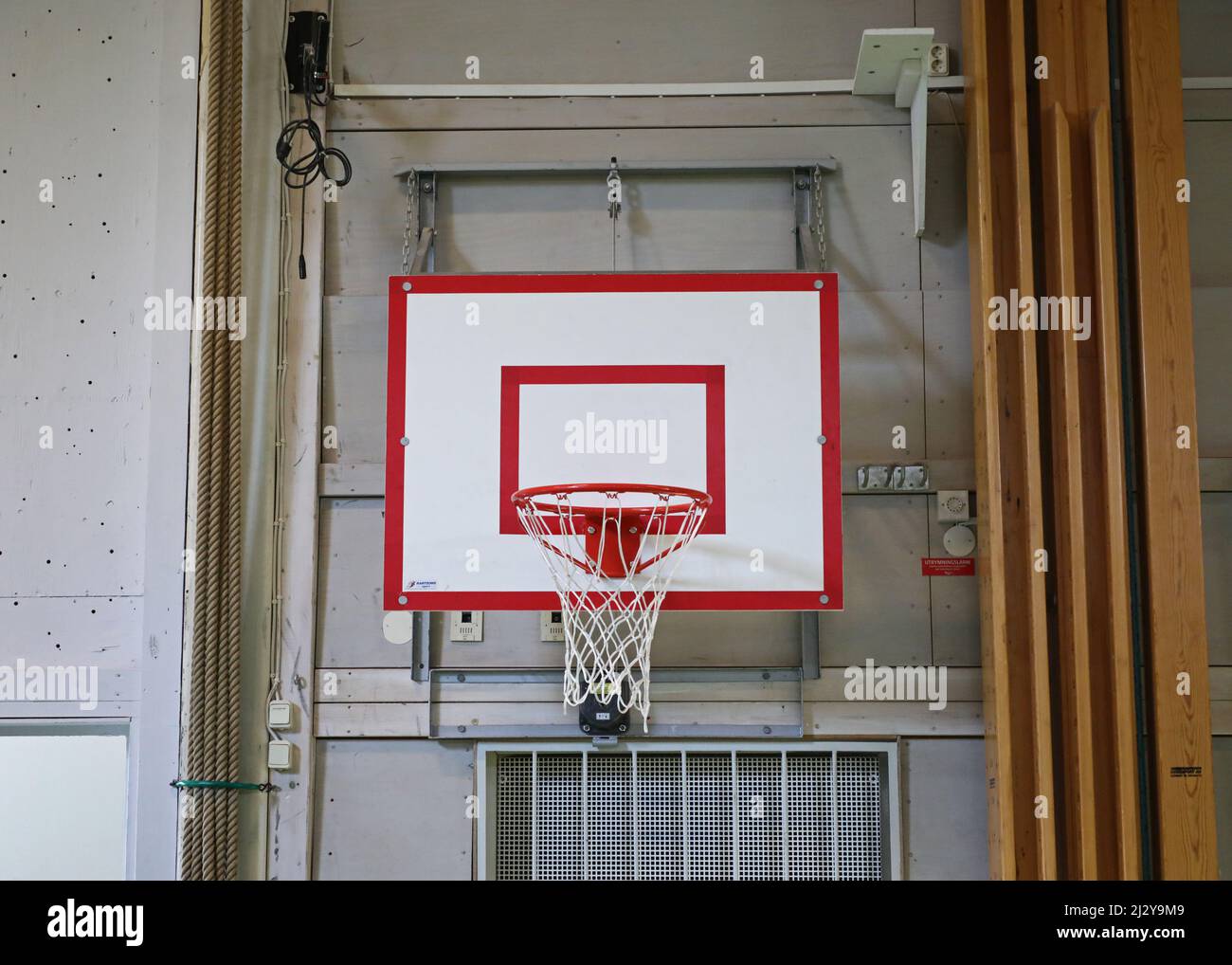 Students from a school during a sports lesson in a sports hall. Here is ...
