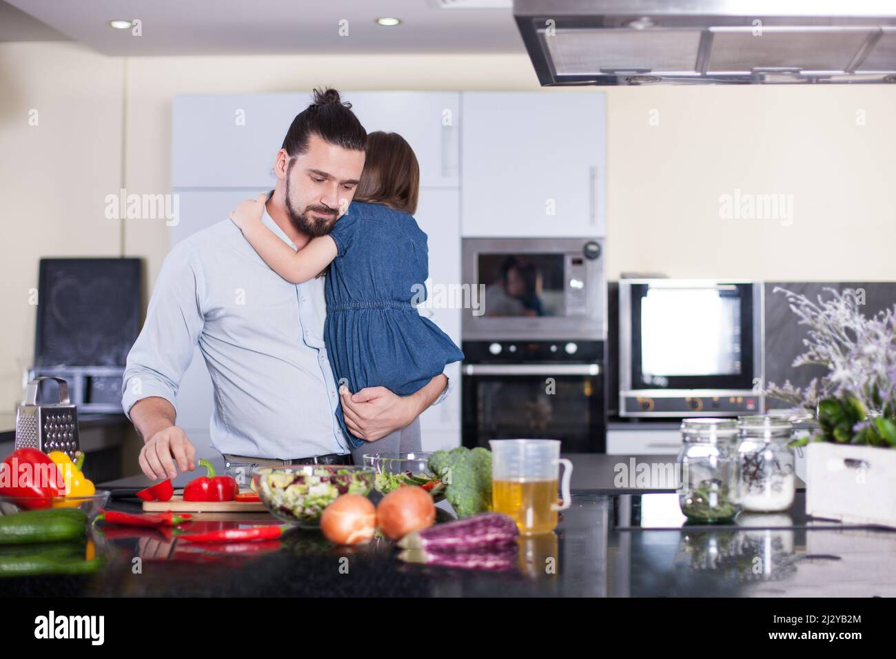 Father children cooking together hi-res stock photography and images ...