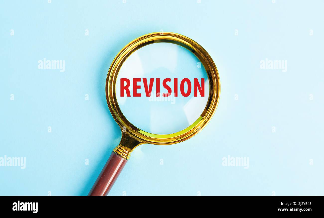Magnifying glass with the word REVISION. Word writing text Revision ...