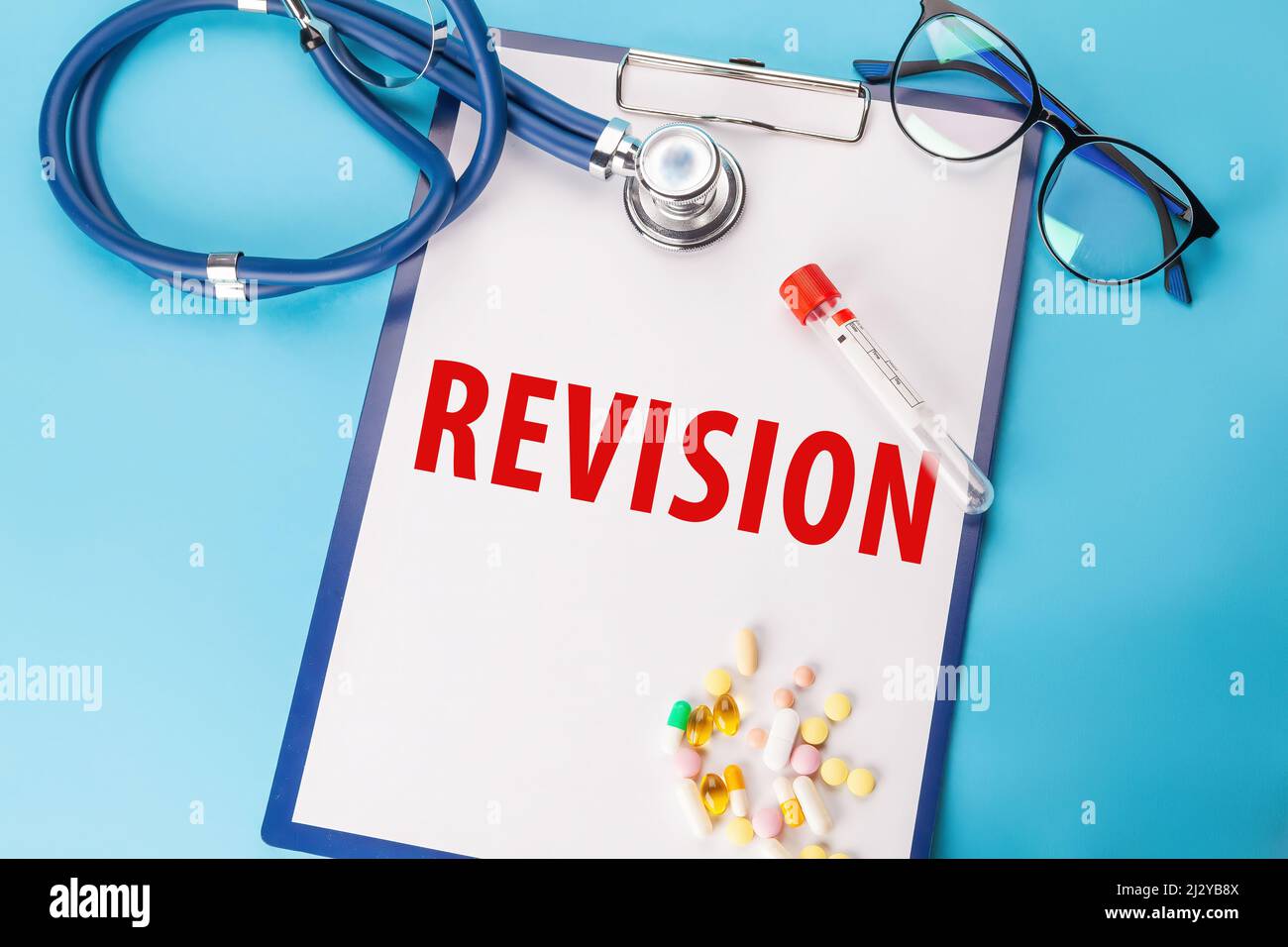 REVISION. Word writing text Revision. Tablet with the diagnosis Atopic ...