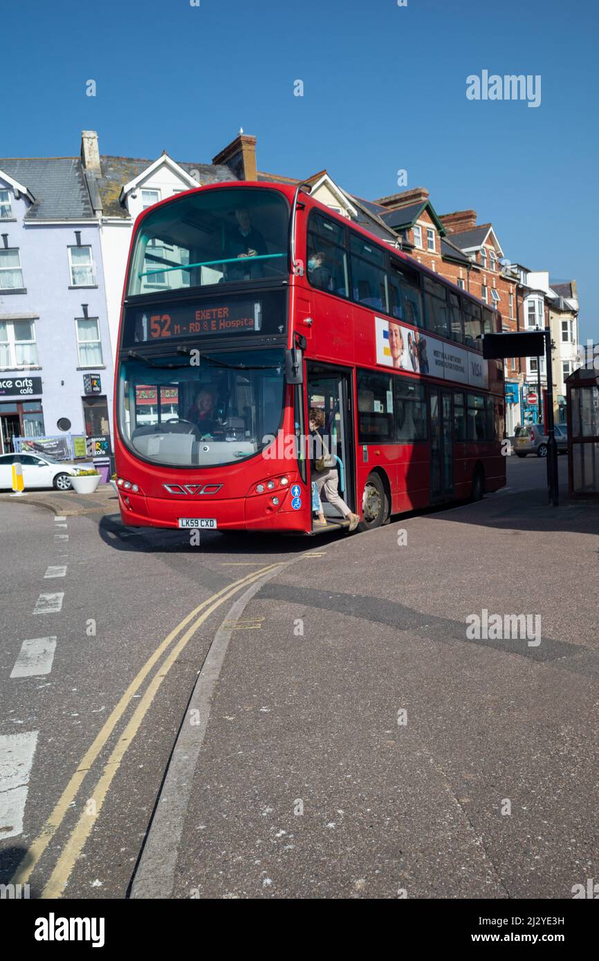 Woman getting on a bus hi-res stock photography and images - Alamy