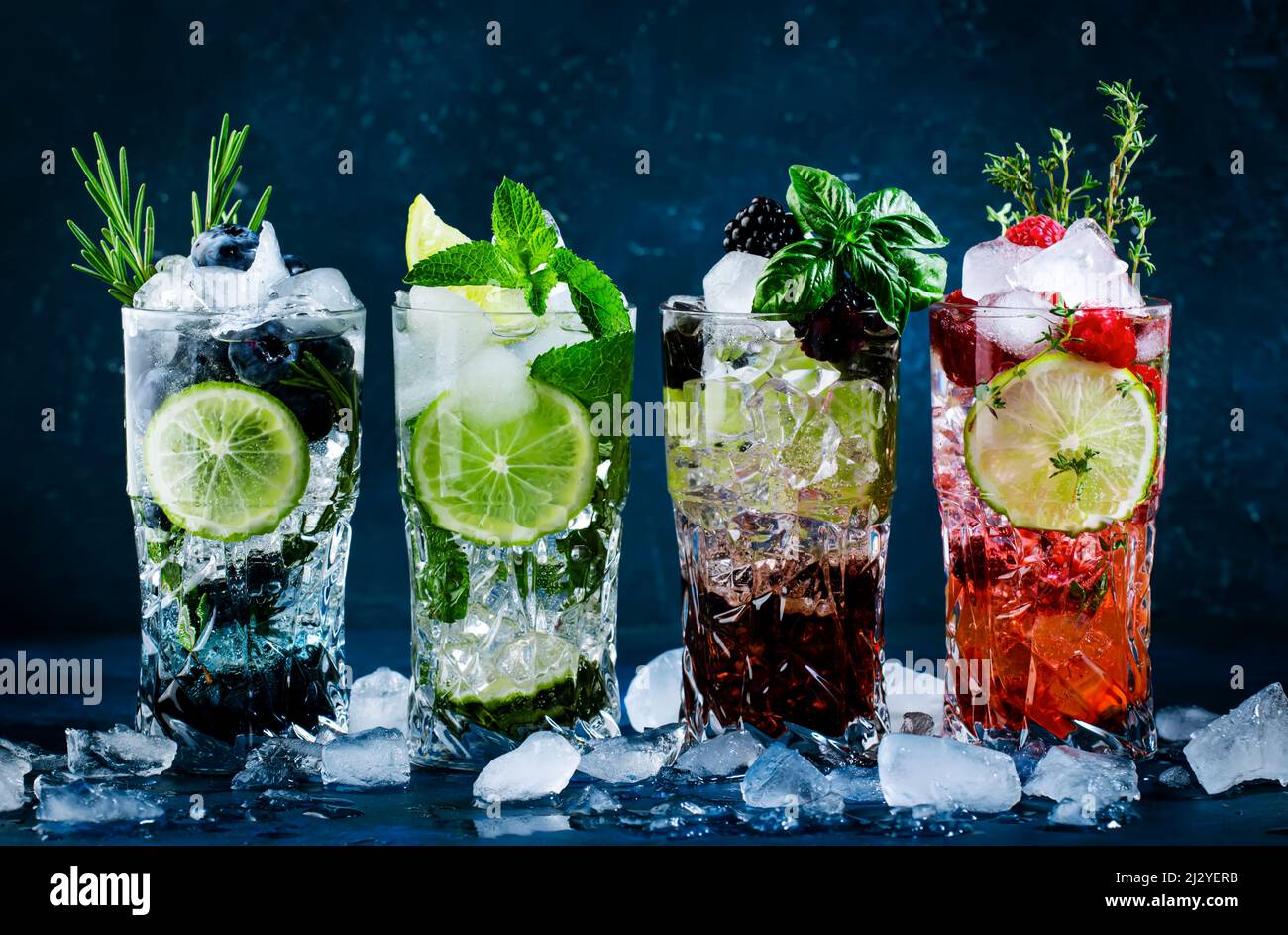 Cold summer cocktails drinks. Classic alcoholic long drink and mojito ...