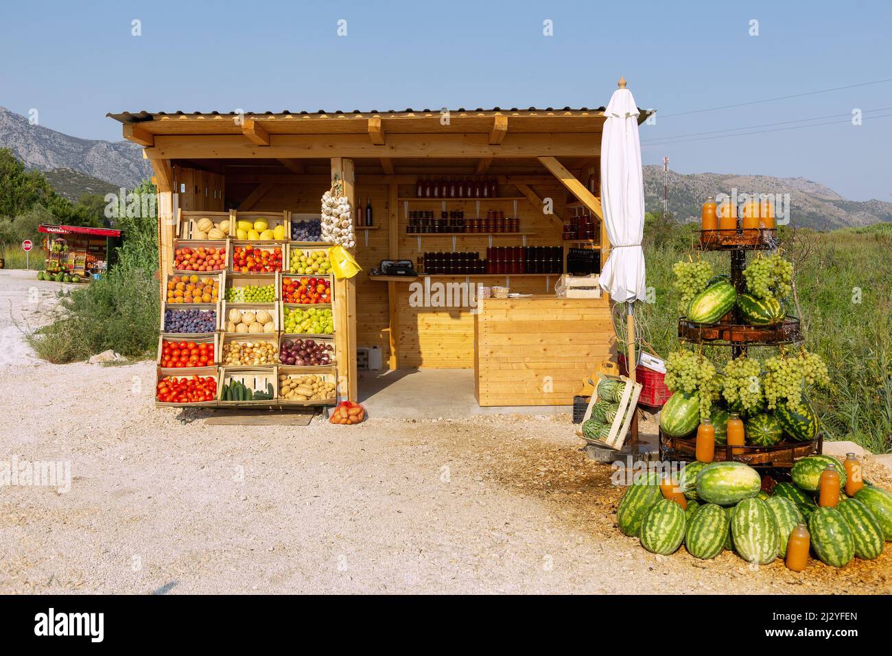 Selling fruit, fresh watermelons, grapes on the roadside in the Nerevta ...