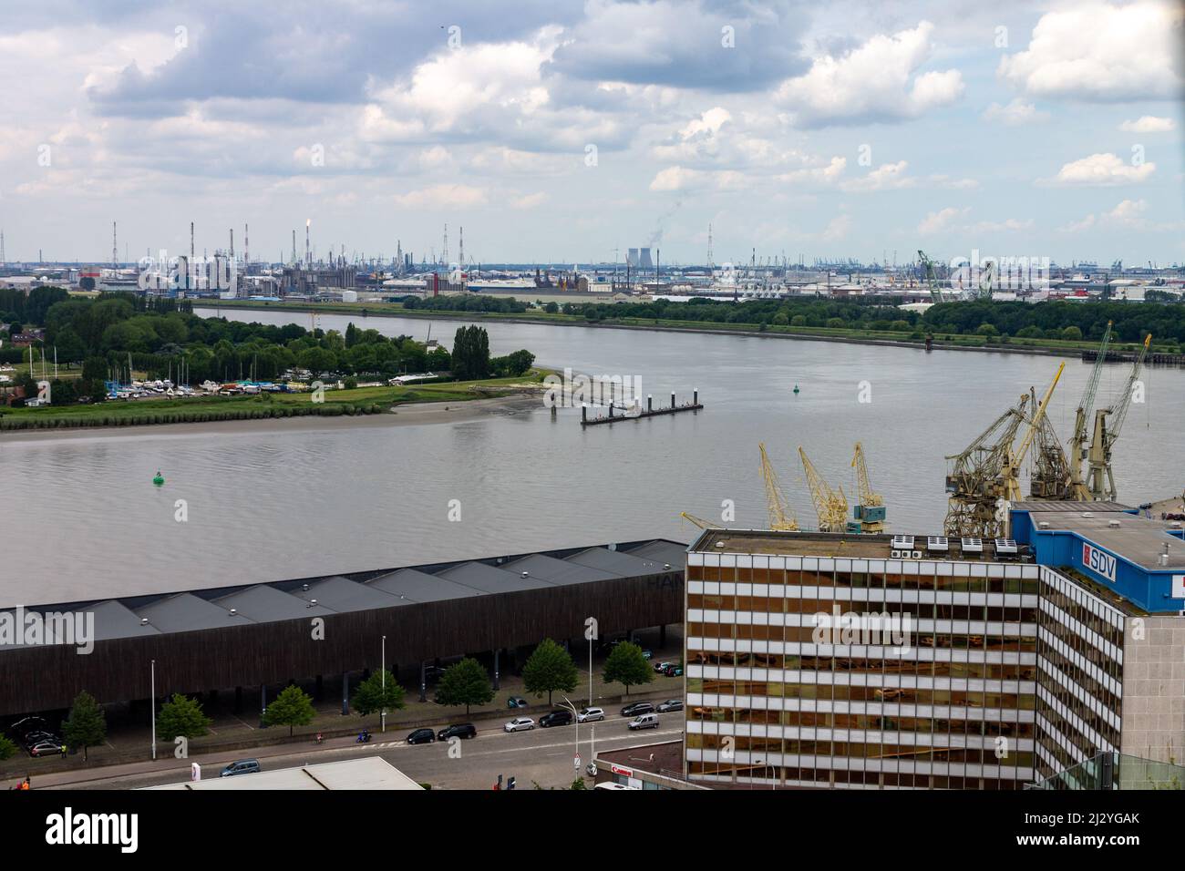 The docks with boats on Scheldt river in Antwerp, Belgium Stock Photo ...