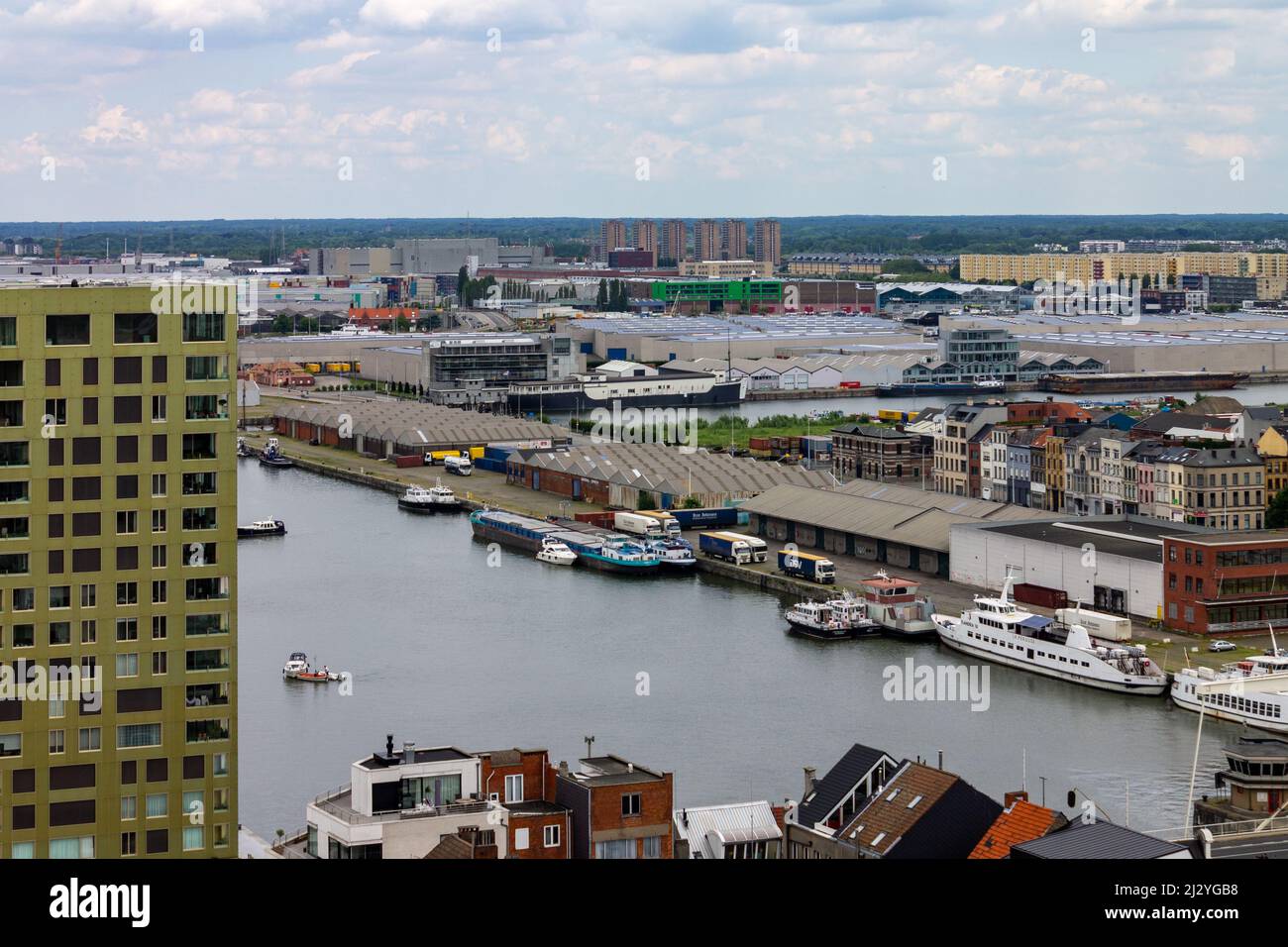 The docks with boats on Scheldt river in Antwerp, Belgium Stock Photo ...