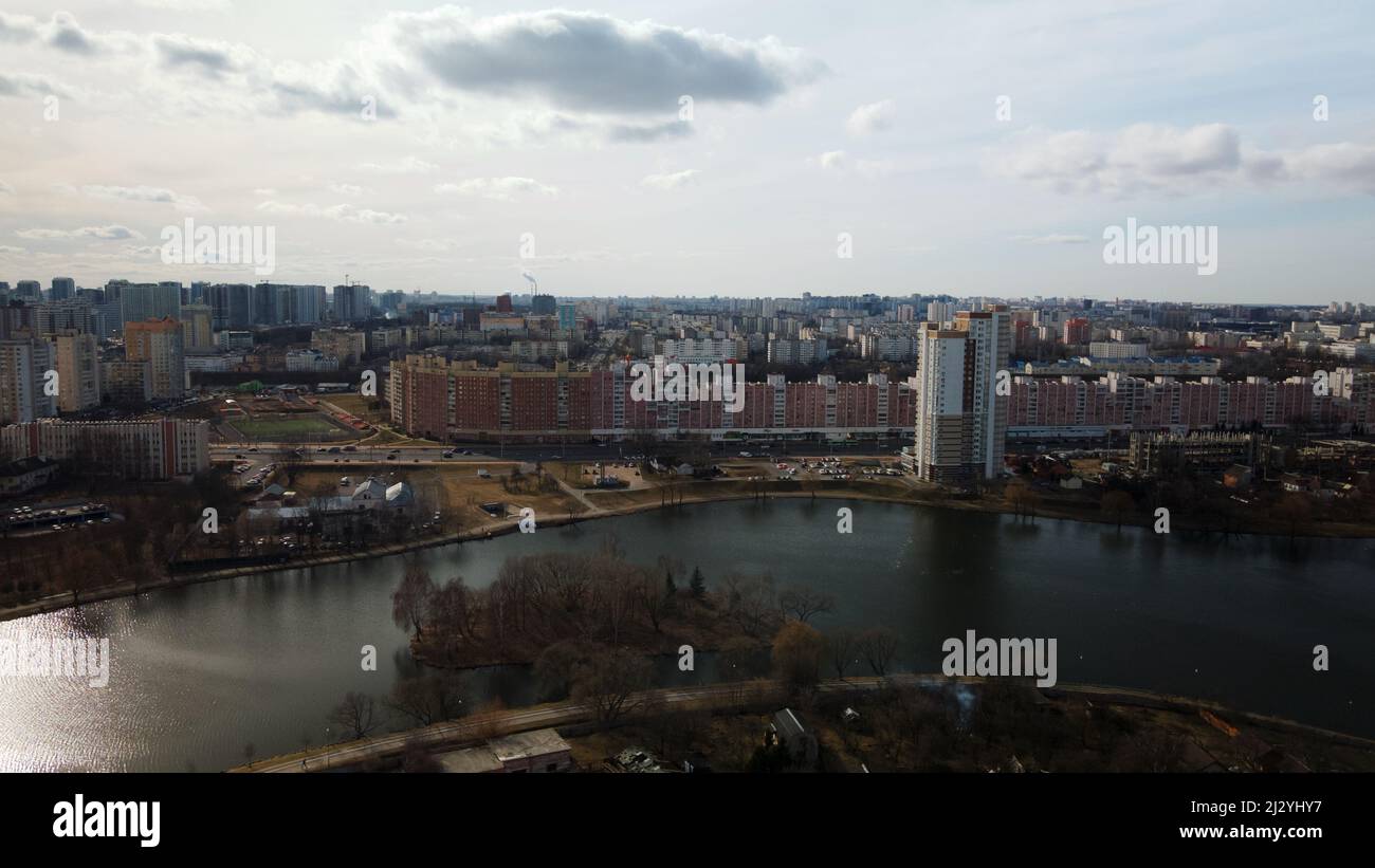 City block near the river. Multi-story houses. Water city system ...