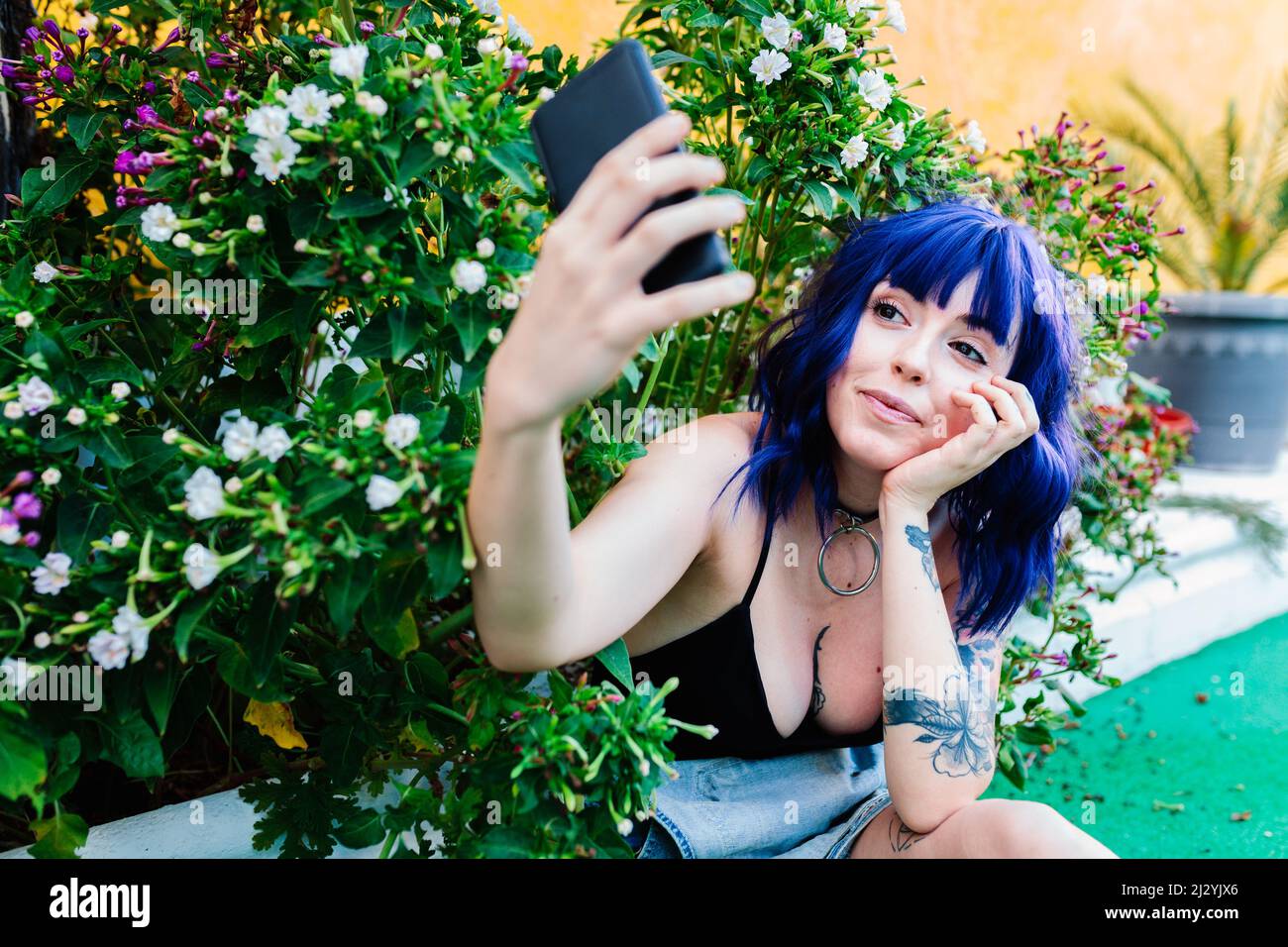 Photo Of Adorable Young Woman Making Selfie Outdoors Backyard Stock