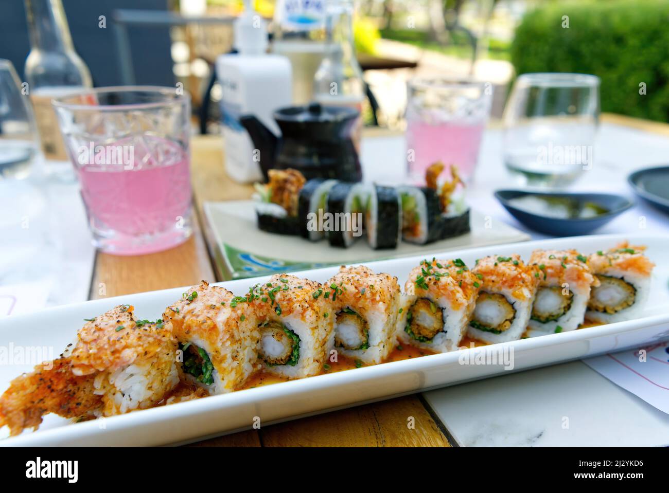 sushi restaurant. Outside table set up and dish presentation. Raw ...