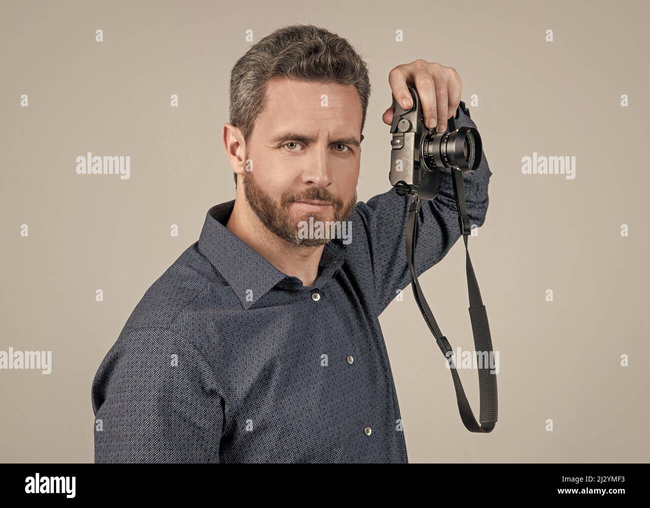 Photography is my hobby. Unshaven man hold photo camera. Hobby concept ...