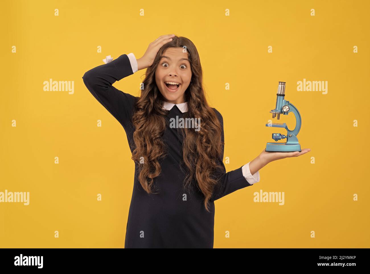 amazed scientist kid with modern scope. harness scientific method ...