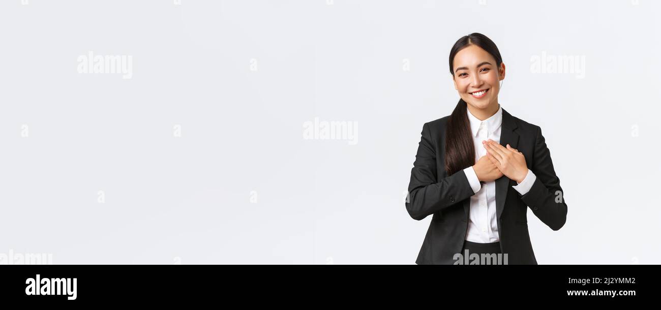 Happy pleased asian female entrepreneur love her clients, feeling ...
