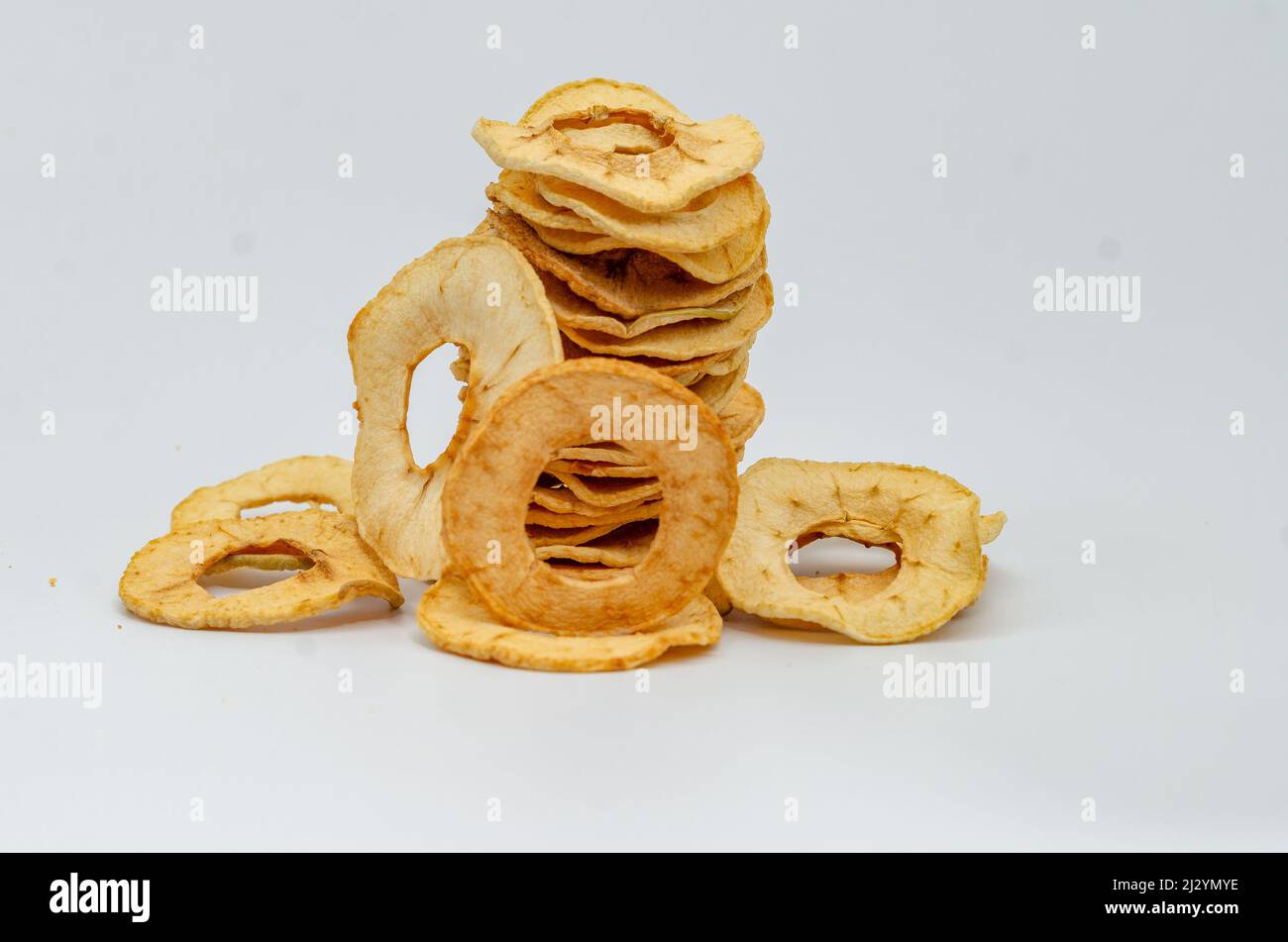 Hill of dried thin apple slices. White background. Healthy Eating Stock ...