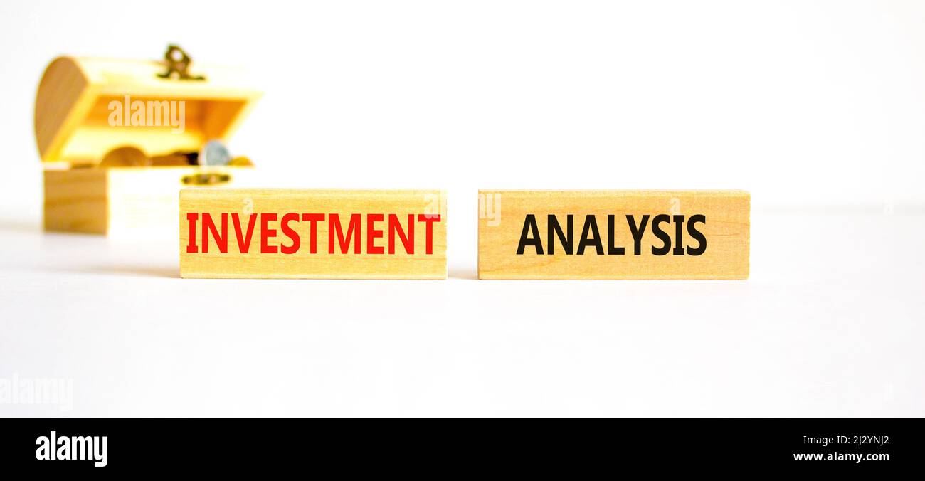 Investment analysis symbol. Wooden blocks with concept words Investment ...