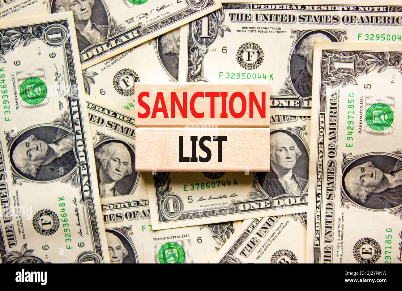 Sanction list symbol. Wooden blocks with concept words Sanction list on ...