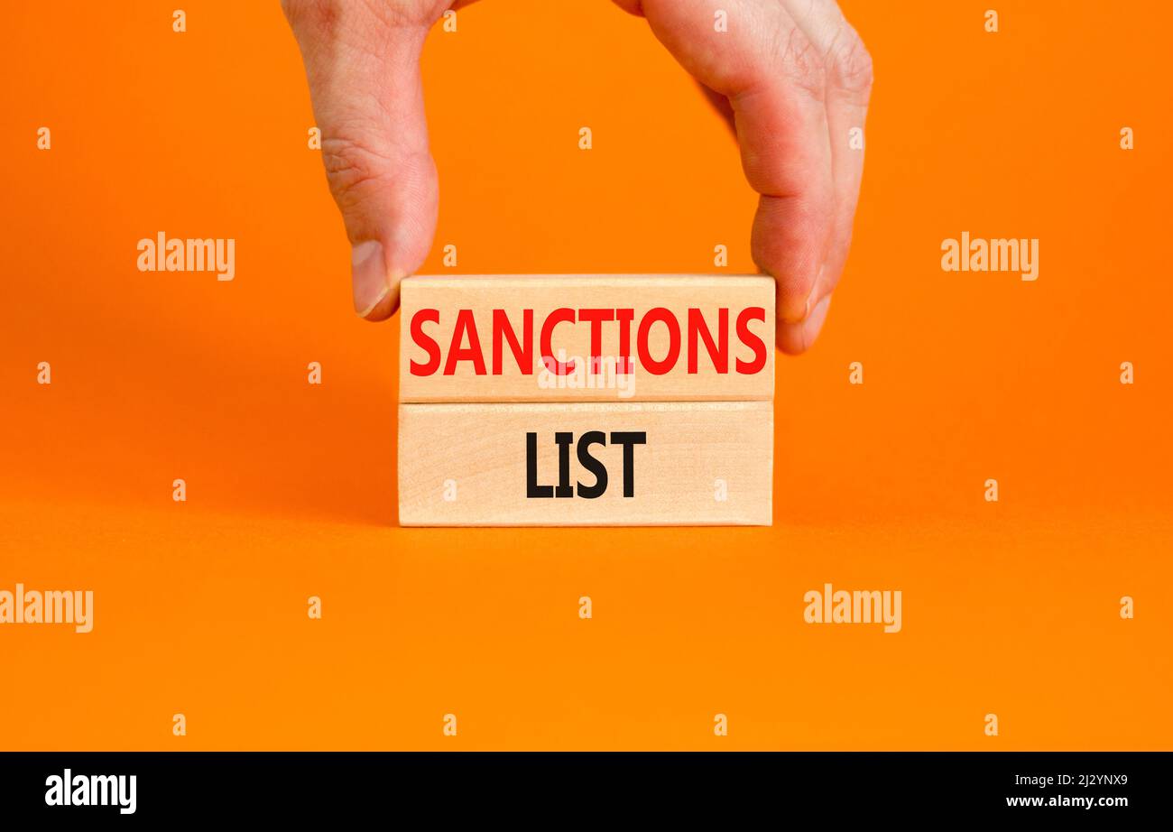 Sanctions list symbol. Wooden blocks with concept words Sanctions list ...