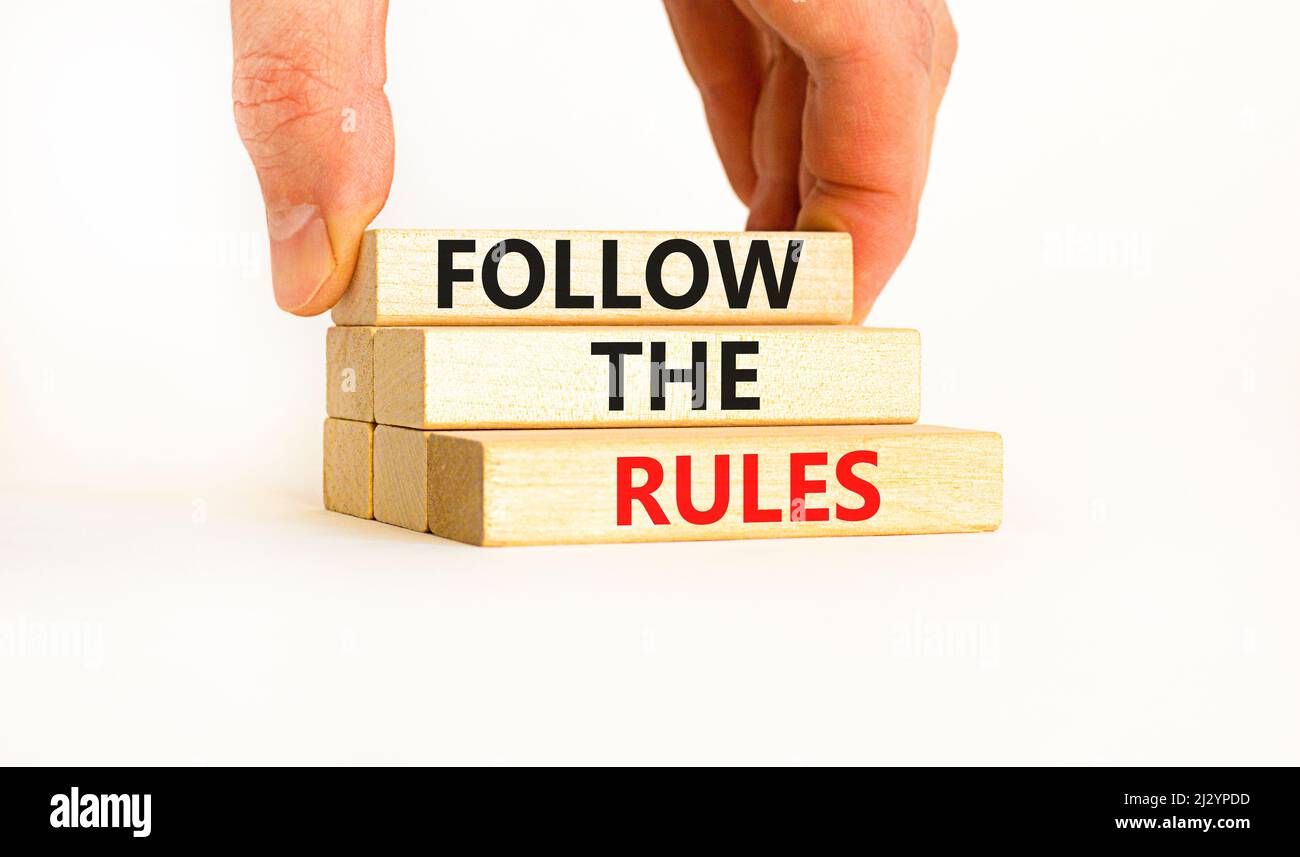 Follow the rules symbol. Concept words Follow the rules on wooden ...