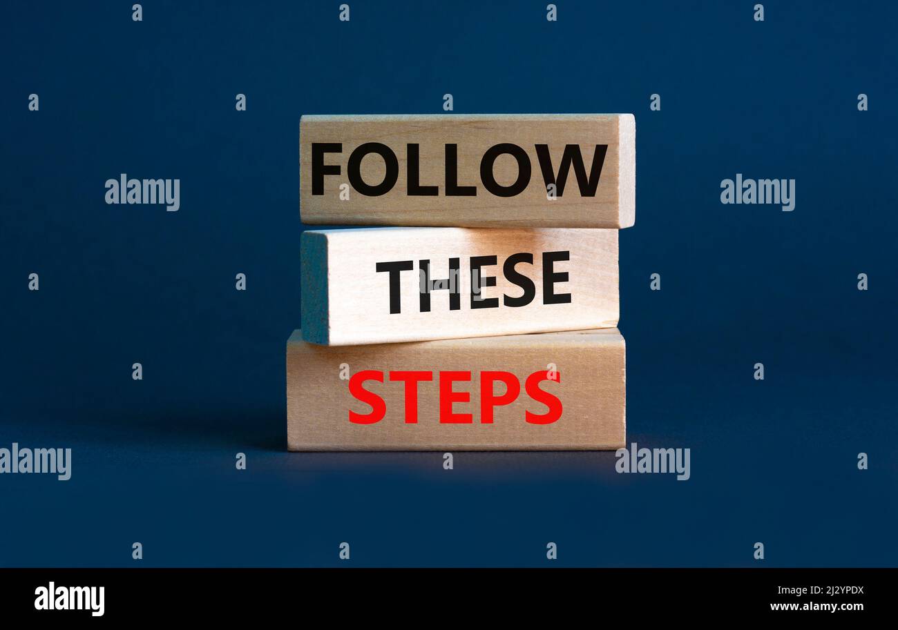 Follow these steps symbol. Concept words Follow these steps on wooden ...