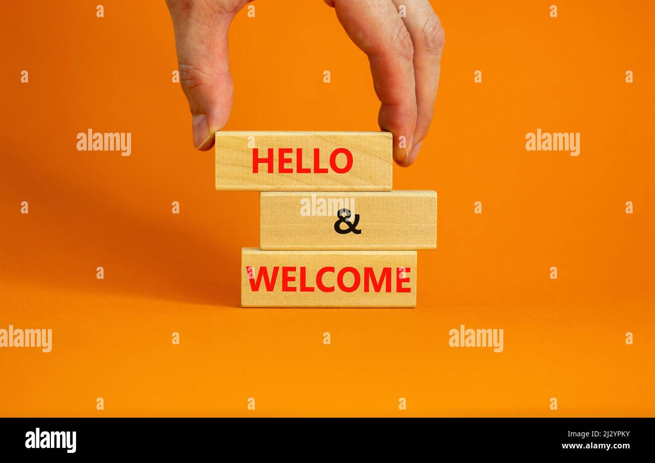 Hello and welcome symbol. Concept words Hello and welcome on wooden ...
