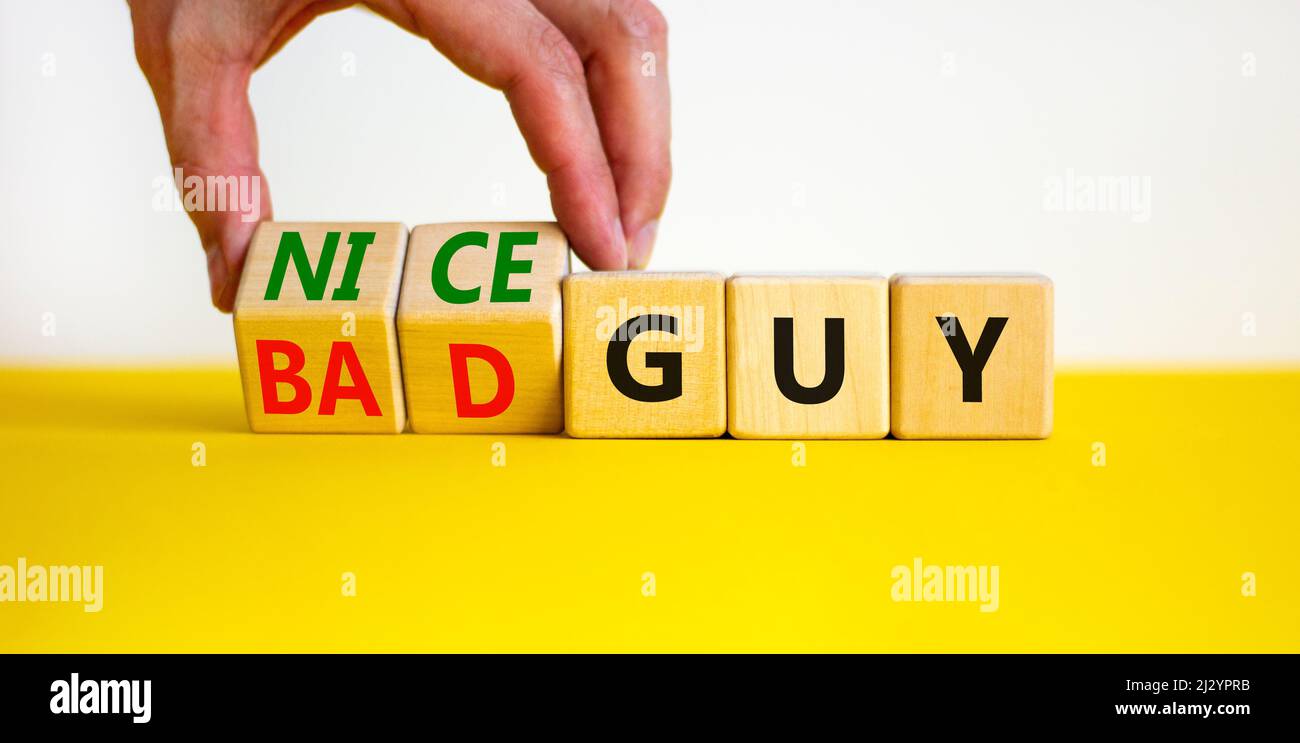 Nice or bad guy symbol. Businessman turns cubes and changes concept ...