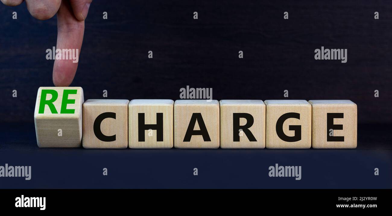 Charge or recharge symbol. Turned wooden cubes and changed the word ...