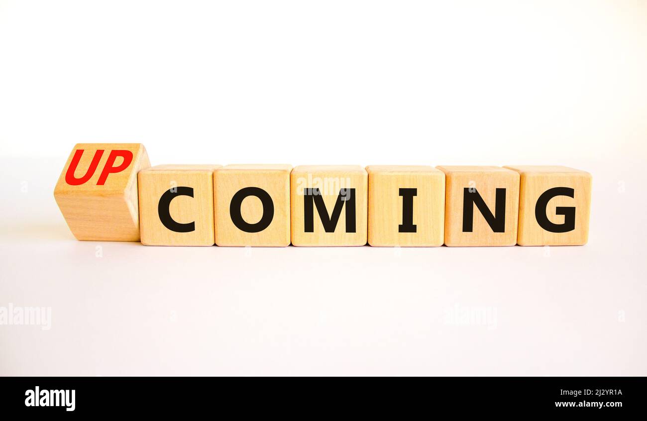 Coming or upcoming symbol. Turned wooden cubes and changed the word ...