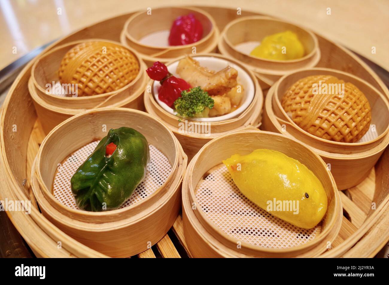 The Cantonese dim sum early morning tea, buns and dumplings Stock Photo ...