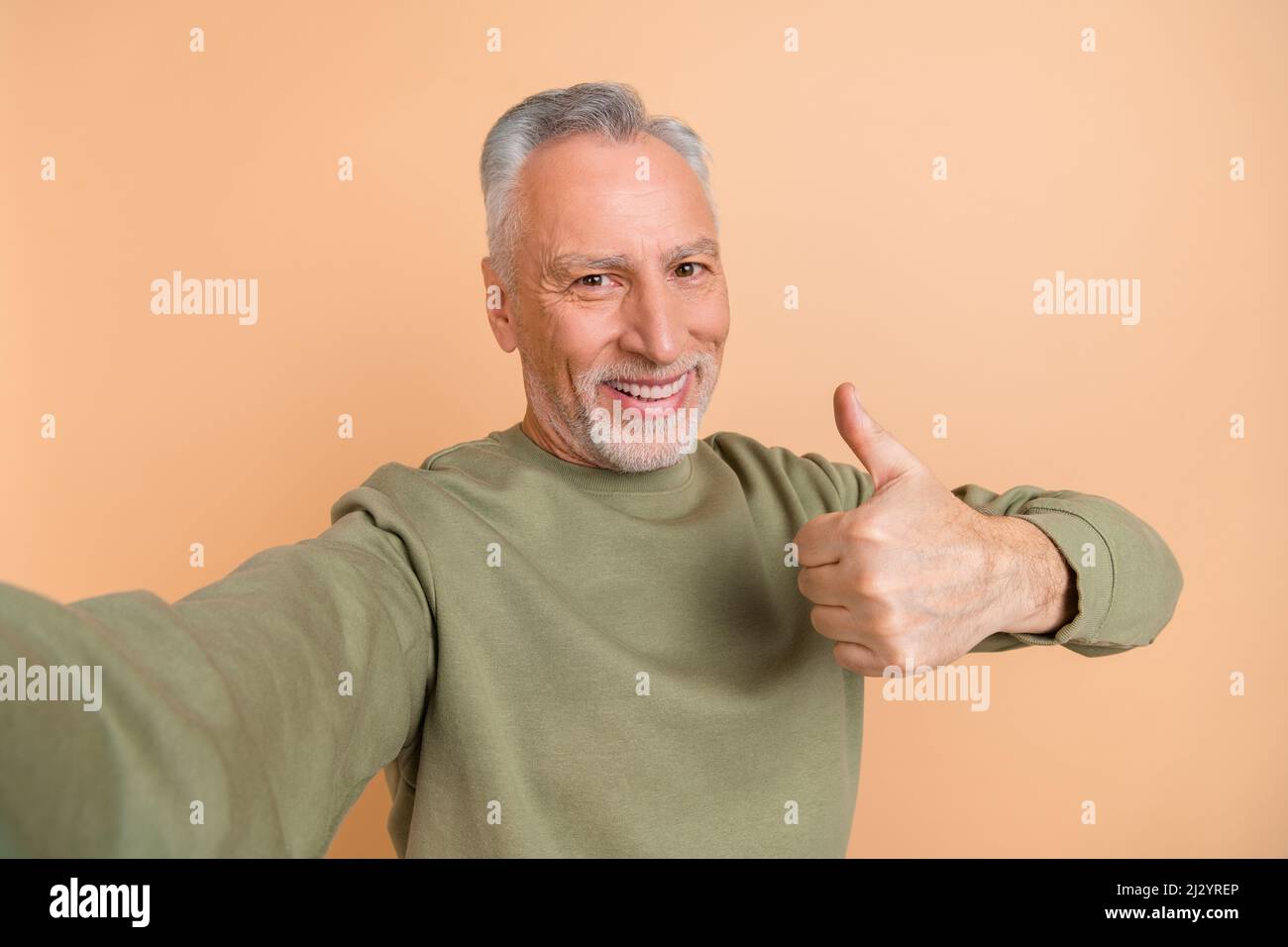 Photo of senior man make selfie show thumb-up feedback good suggest ads ...