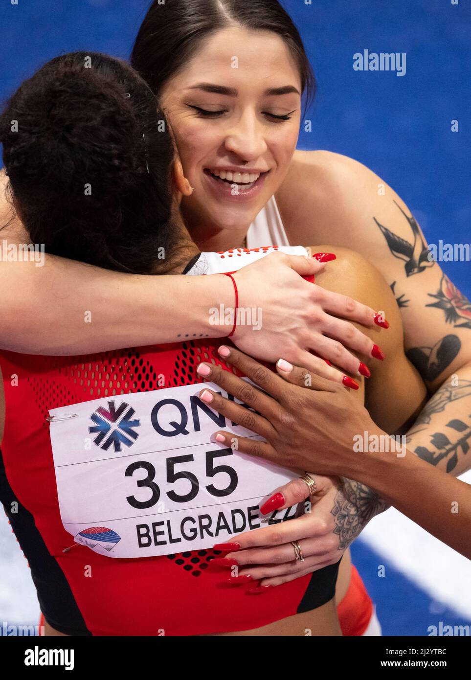Mujinga Kambundji SUI and Ewa Swoboda POL celebrate after competing in the women’s 60m final on ...