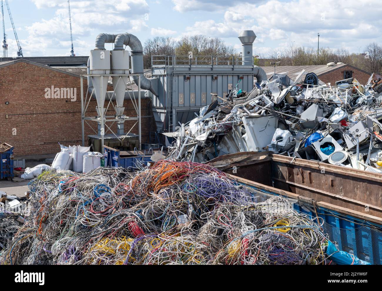 A scrape metal yard full of used metal parts waiting to be recycled ...