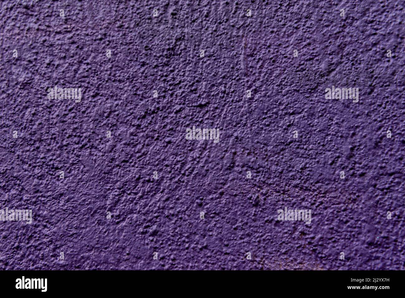 A purple textured wall for background Stock Photo - Alamy